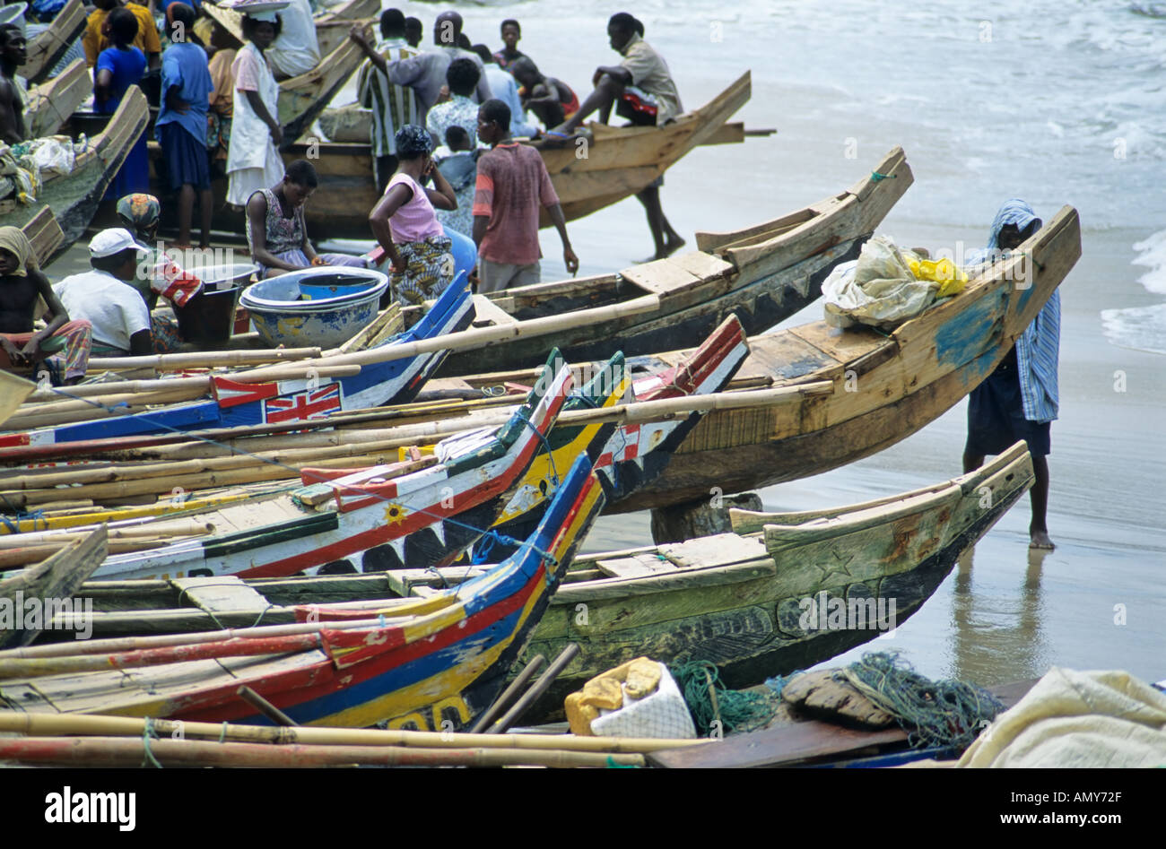 Fishing boats and fishermen, Cape Coast, Ghana Stock Photo - Alamy