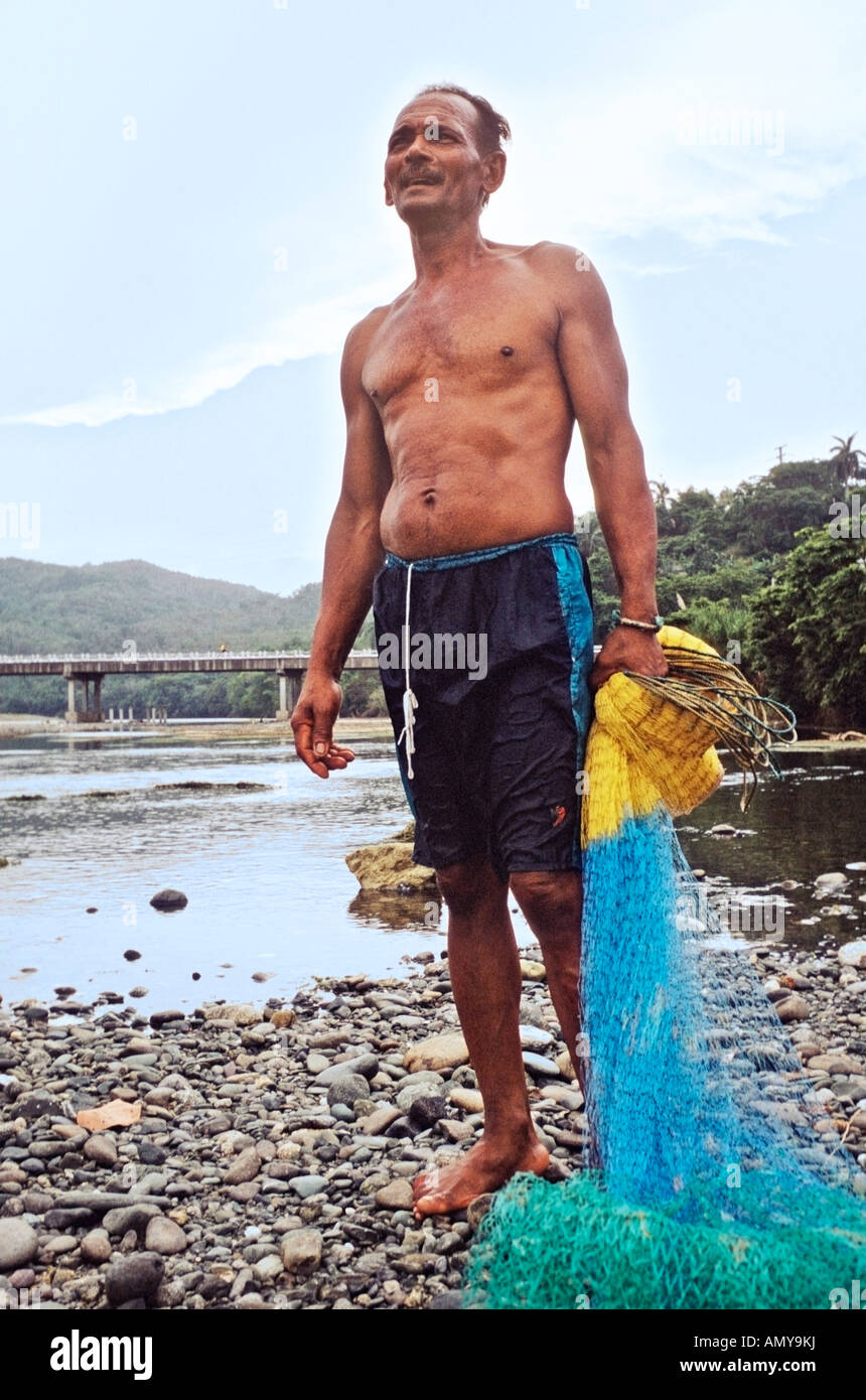 Cuban fisherman with castnet on the Río Toa west of Baracoa Cuba Stock ...