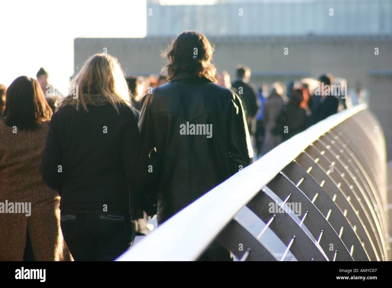 people crossing millennium bridge near towards Tate Modern Stock Photo ...