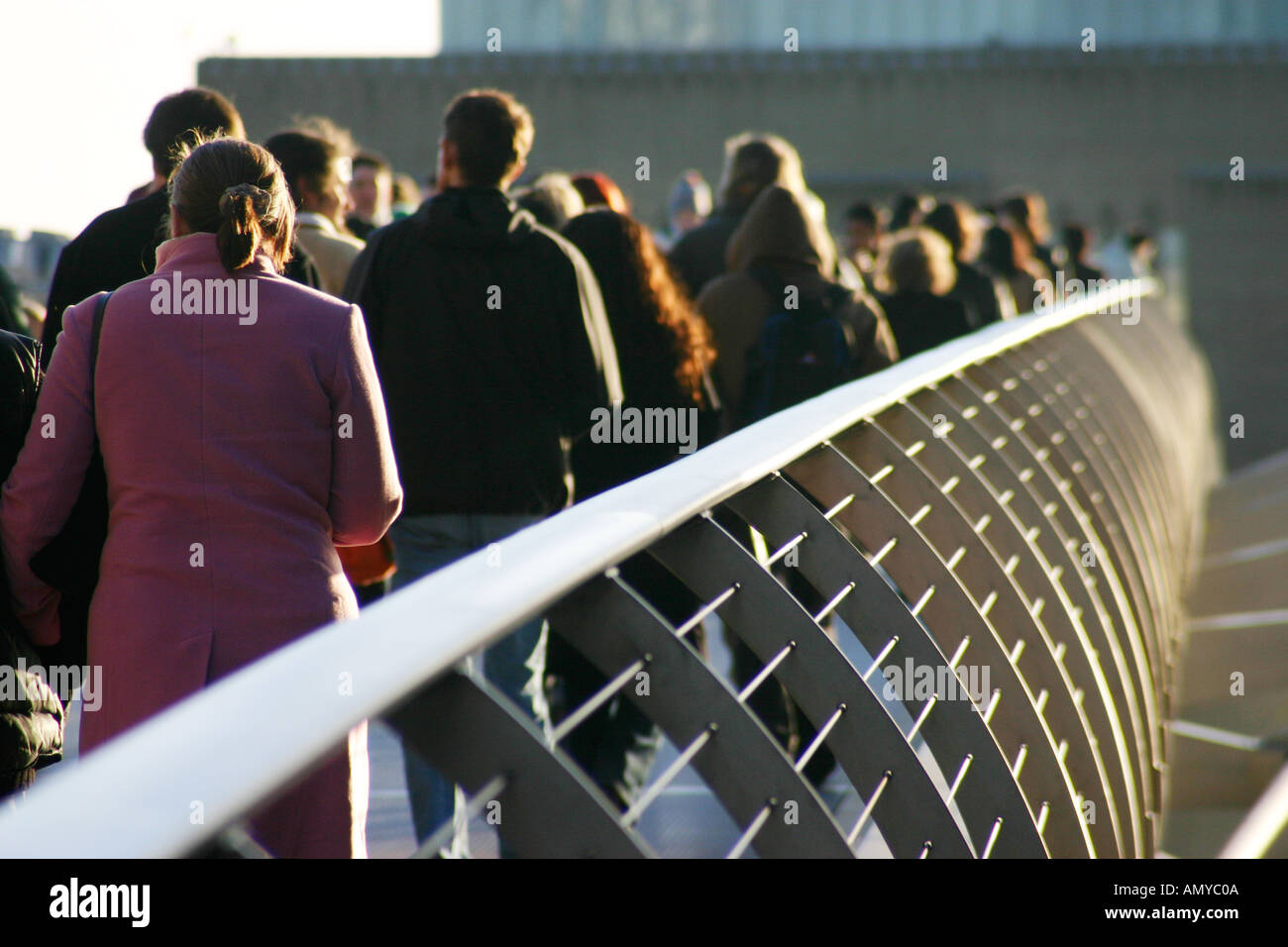 people crossing millennium bridge near towards Tate Modern Stock Photo ...