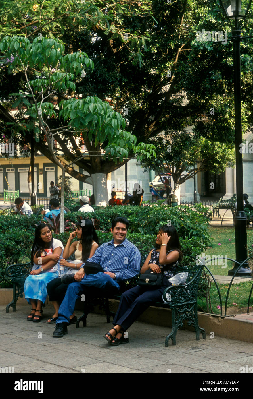 Mexican woman sitting on bench hi-res stock photography and images - Alamy