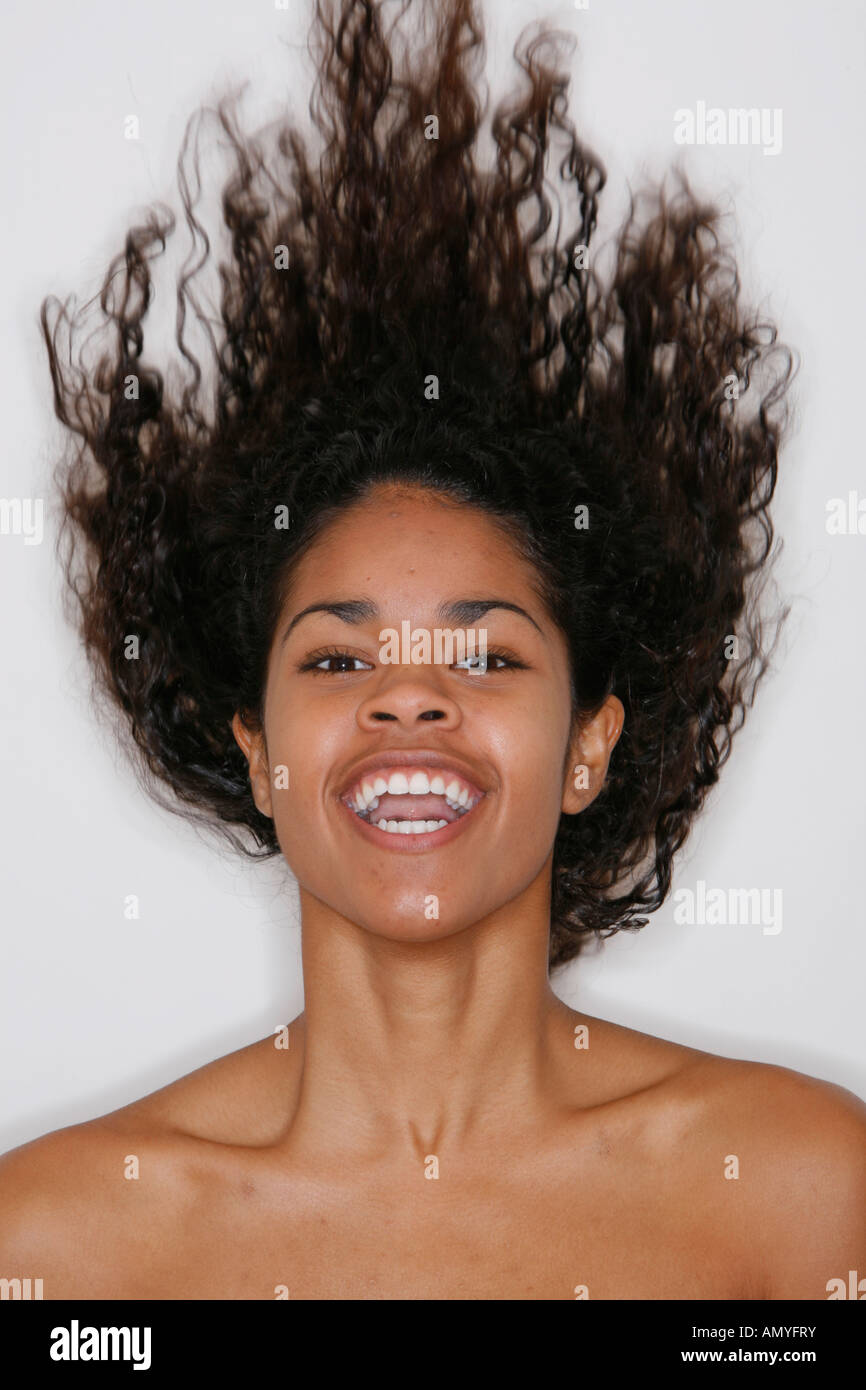 Young woman tossing hair MR-12-17/18-07 Stock Photo - Alamy