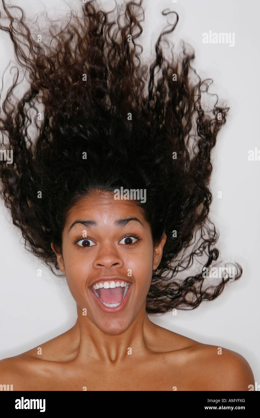 Young woman tossing hair MR-12-17/18-07 Stock Photo - Alamy