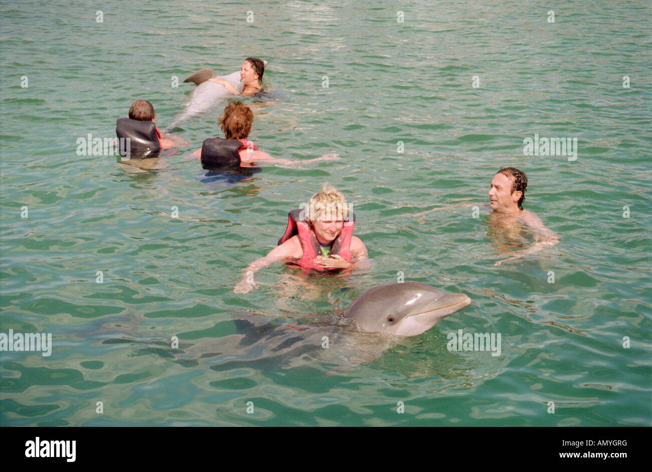 Tourists near Guardalavaca, Cuba, swimming in an enclosure in the sea ...