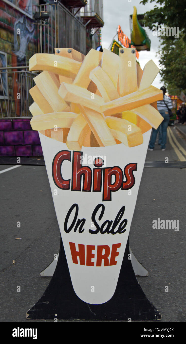 Free standing painted advertisement for chips, or french fries, at a ...