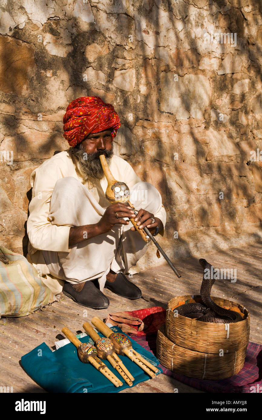 Snake charmer playing flute cobra in hi-res stock photography and ...