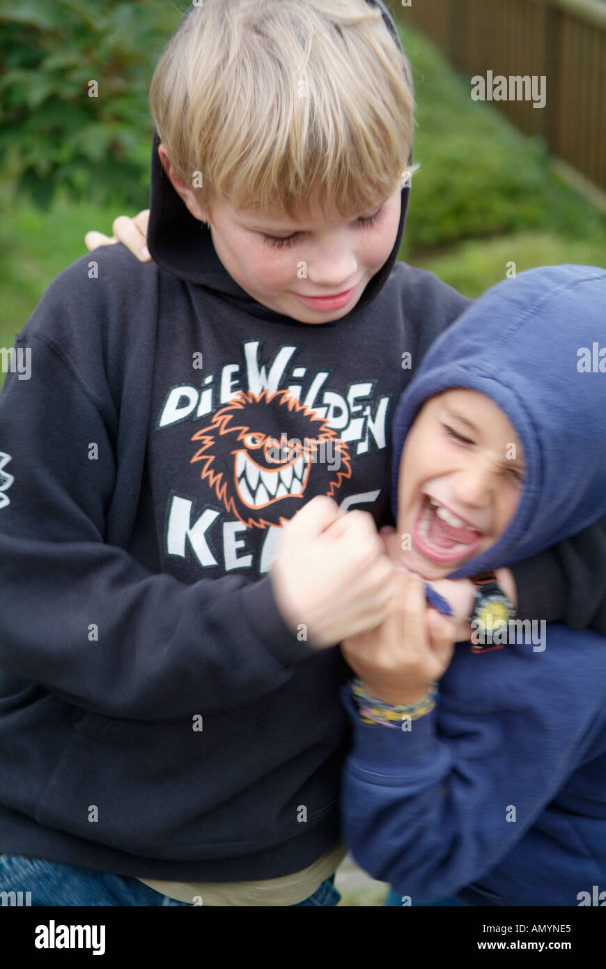 Boys tussle hi-res stock photography and images - Alamy