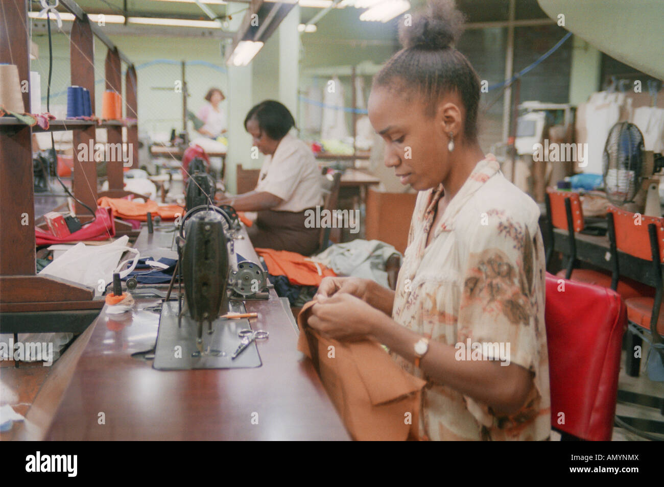 Female sewing machinist work hi-res stock photography and images - Alamy
