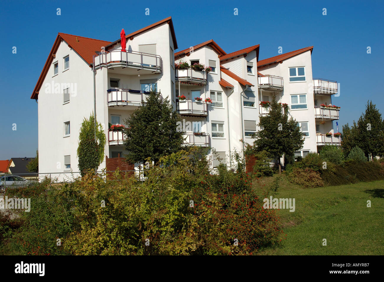 New building settlement with a family and terraced houses Stock Photo ...