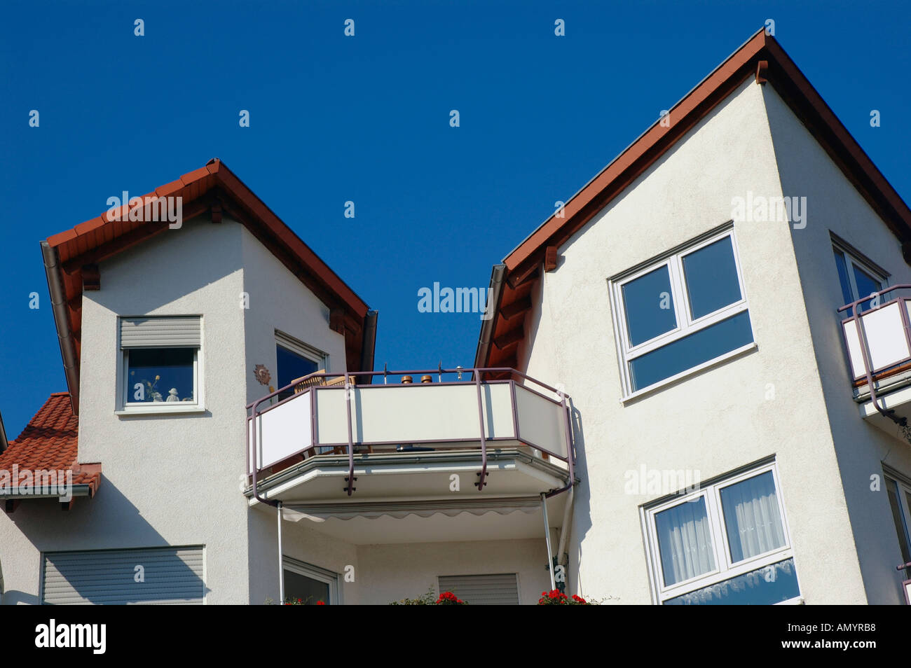 New building settlement with a family and terraced houses Stock Photo ...
