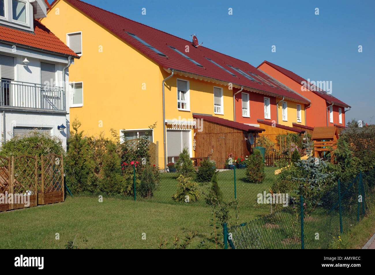 New building settlement with a family and terraced houses Stock Photo ...