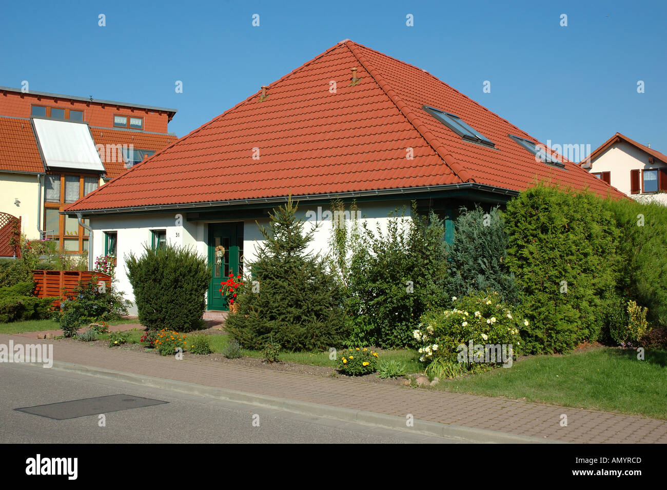 New building settlement with a family and terraced houses Stock Photo ...