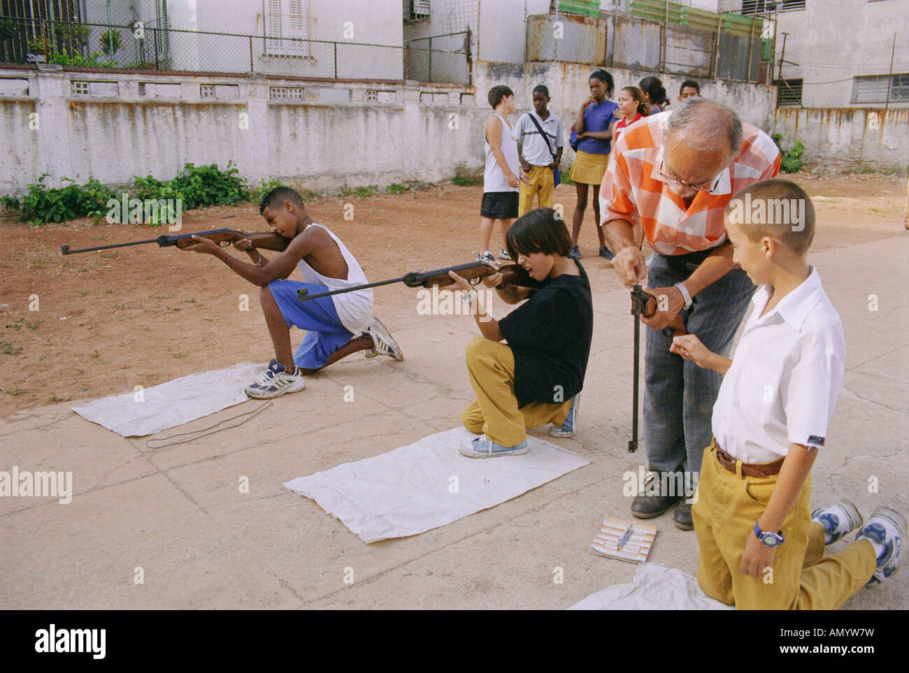 School children learning to shoot guns Stock Photo - Alamy