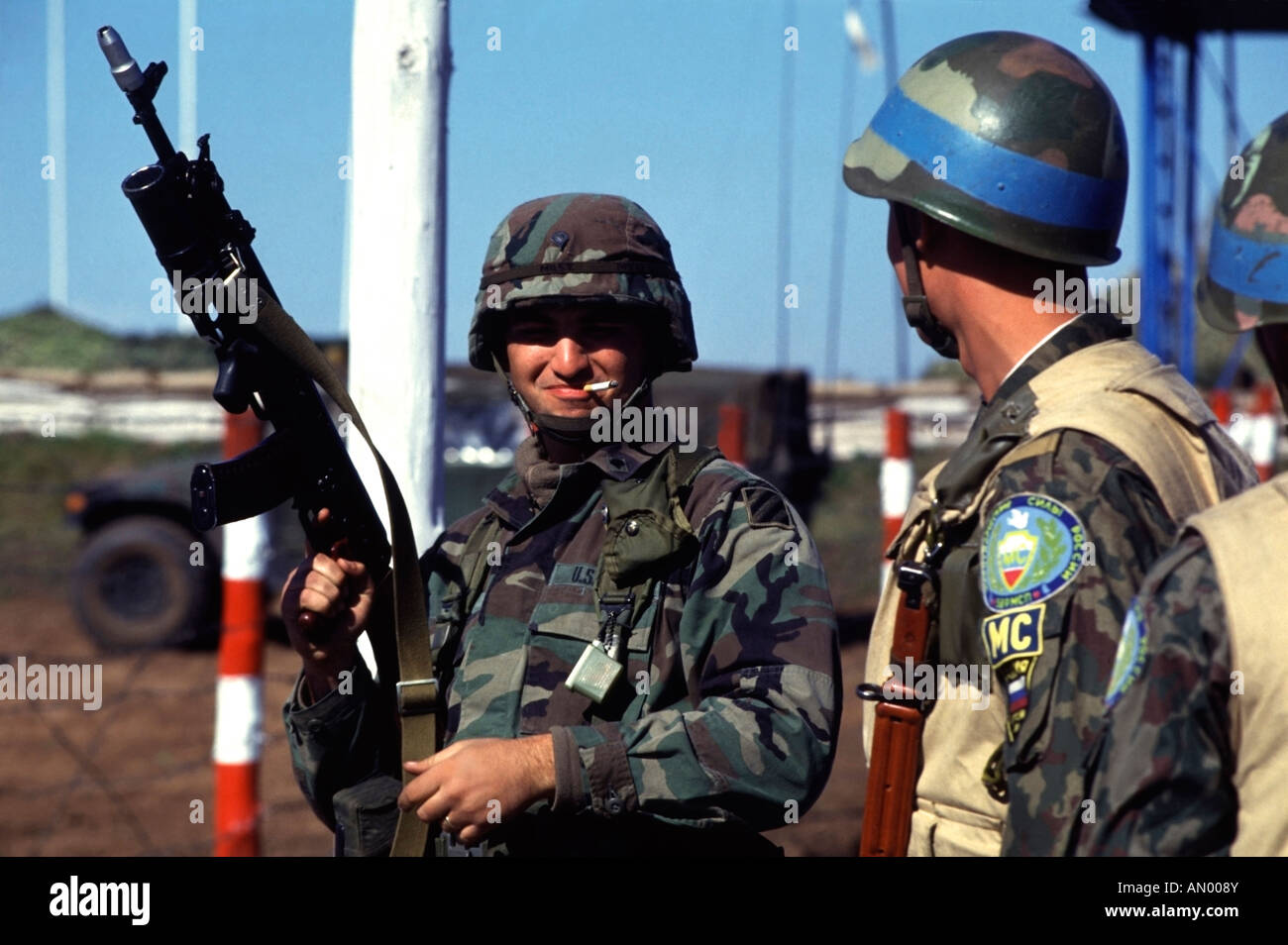 American Soldier holds a Russian Soldier's Kalashnikov during ...