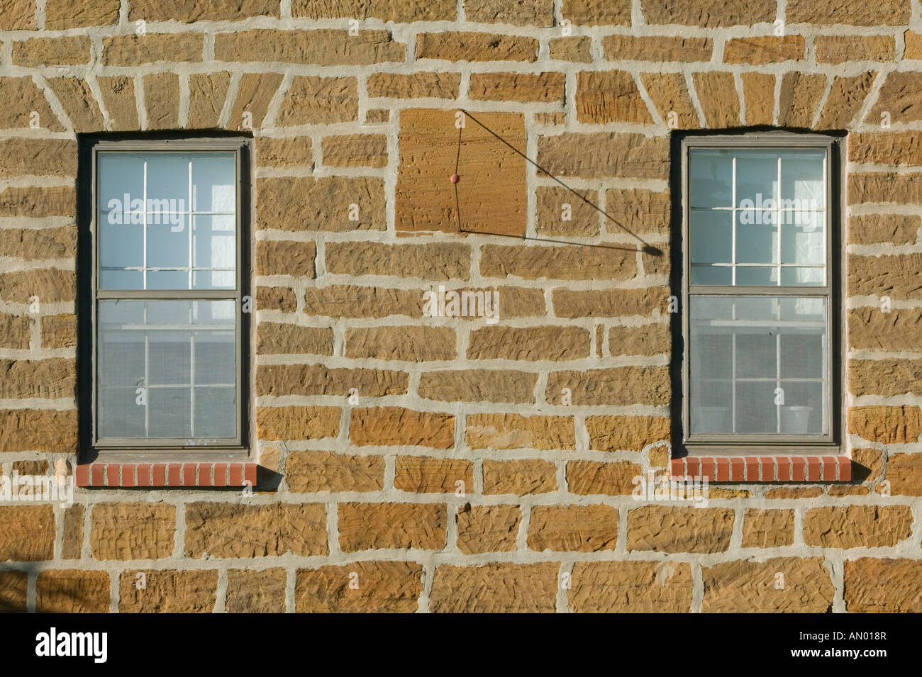USA, IOWA, Amana Colonies, West Amana: Stone Wall with Sundial Stock ...
