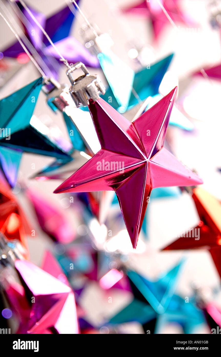 Coloured Christmas star decorations on a white background Stock Photo ...