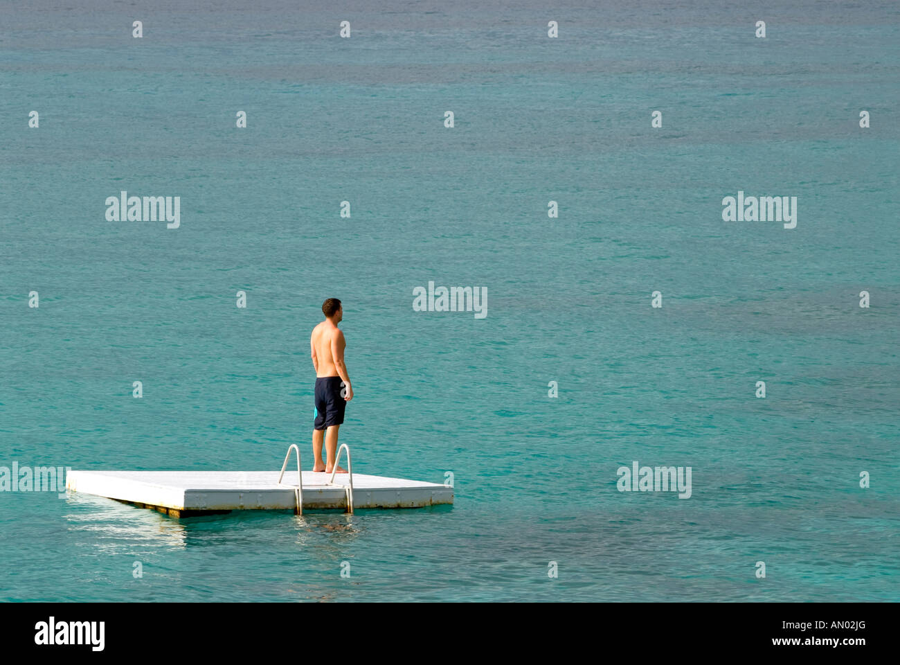 Man standing on floating pontoon hi-res stock photography and images ...