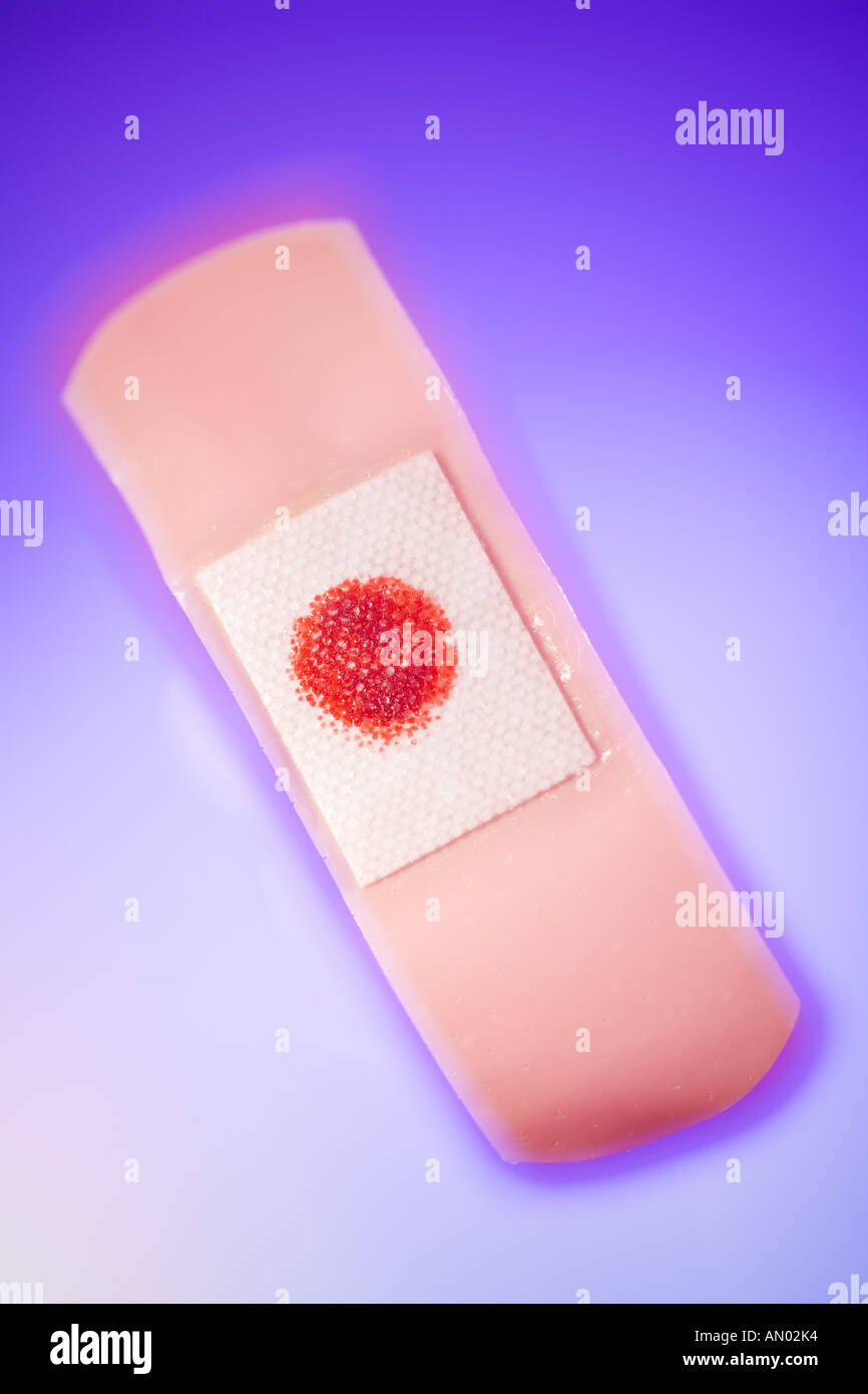 Close up of a blood stain on an adhesive bandage Stock Photo - Alamy