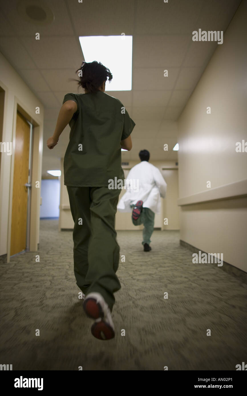 Doctor running behind hi-res stock photography and images - Alamy