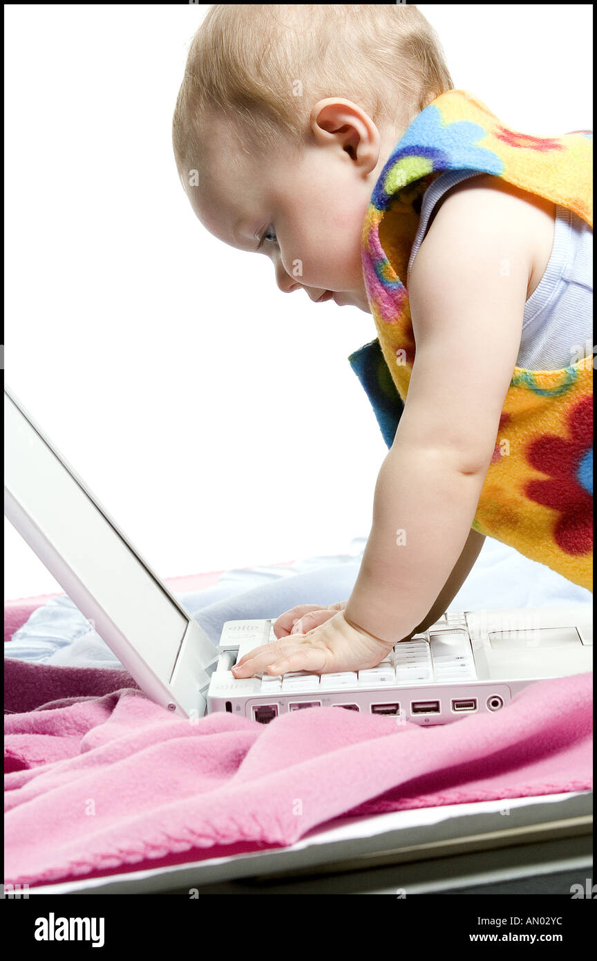 Profile of a baby with a laptop Stock Photo - Alamy