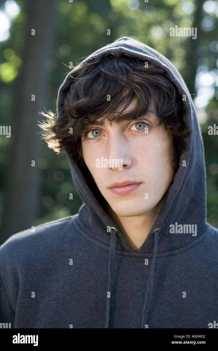 Portrait of a teenage boy thinking Stock Photo - Alamy
