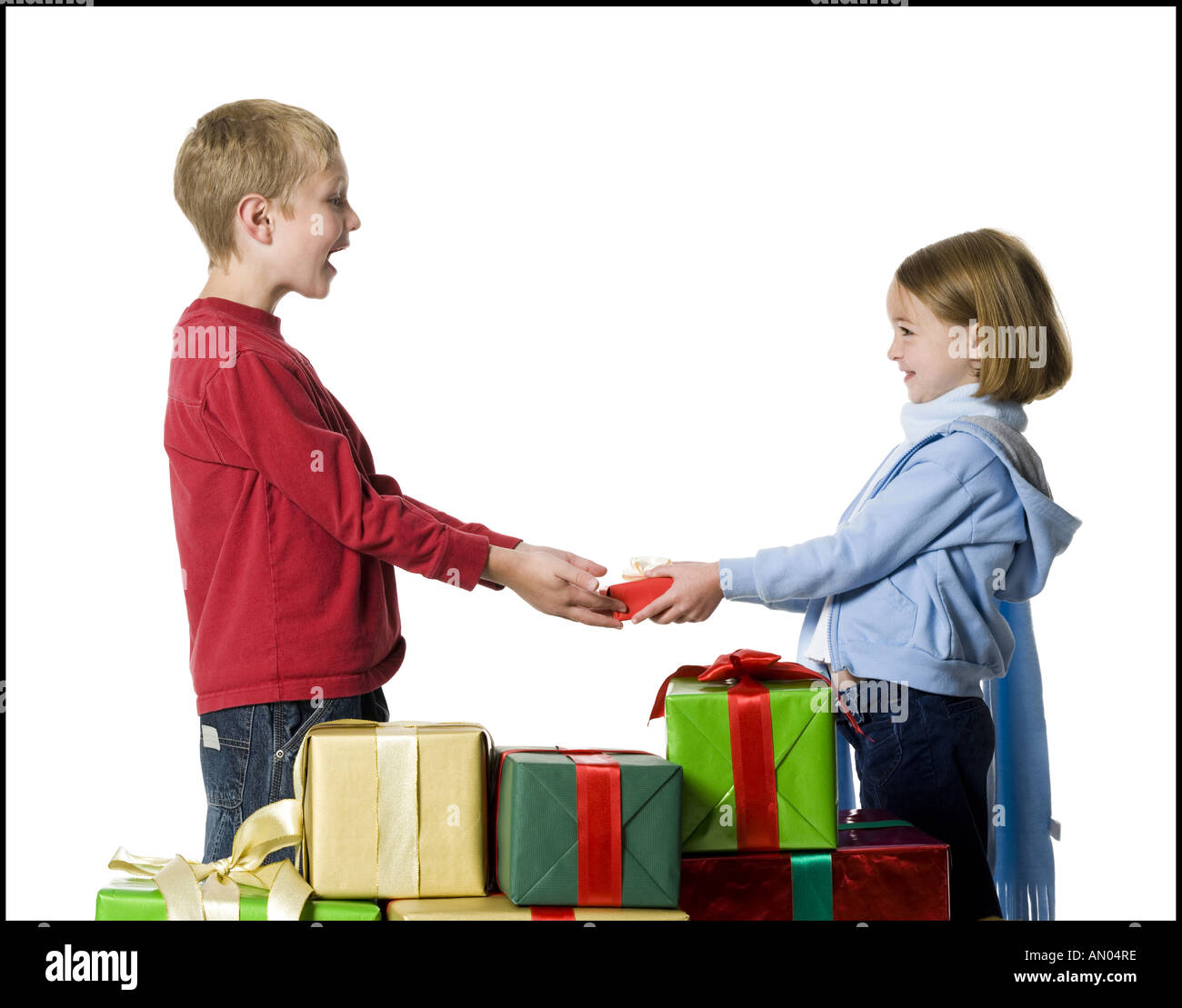 Profile of a sister giving gift to her brother Stock Photo - Alamy