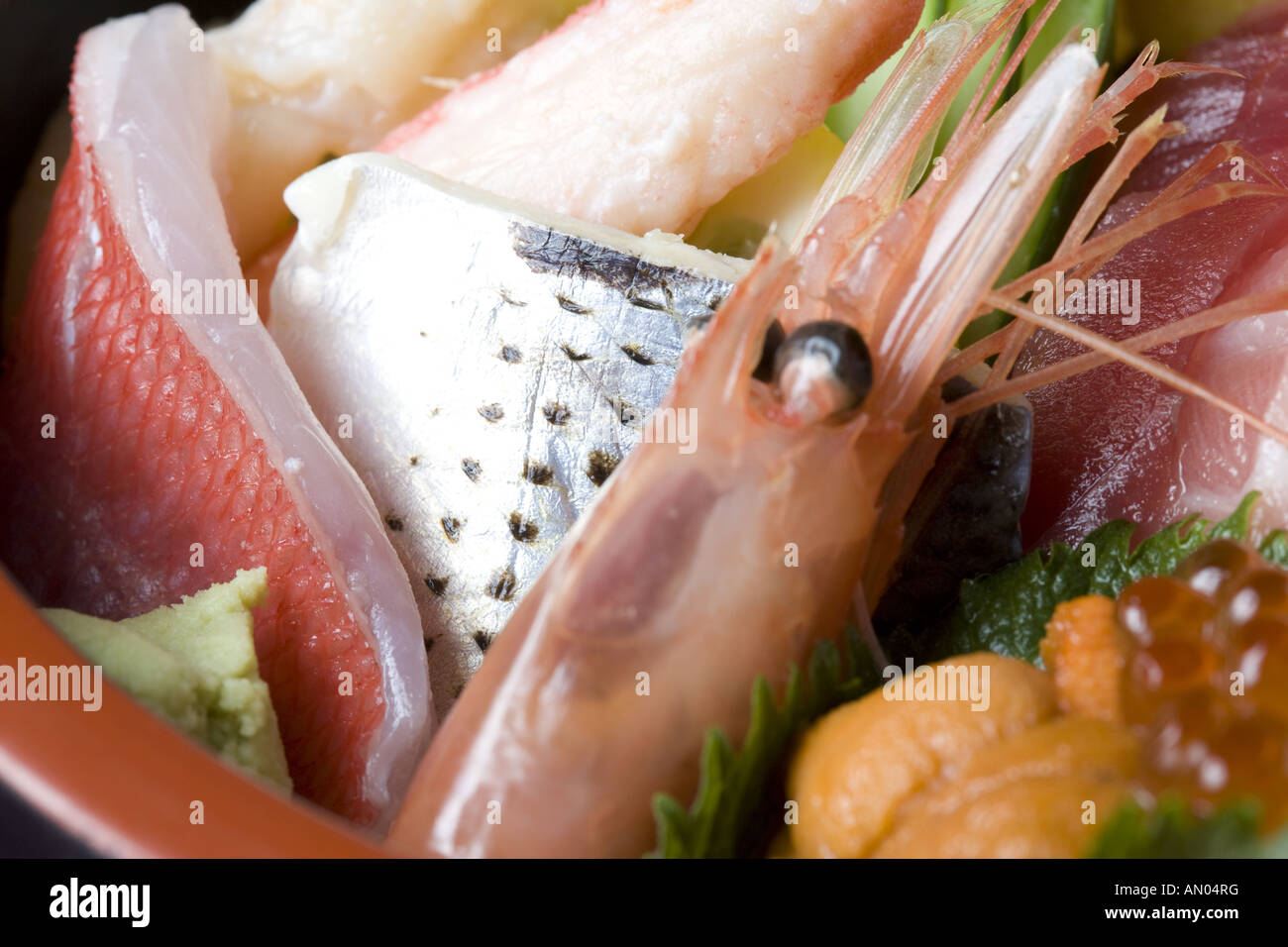 Assorted sashimi on rice Stock Photo - Alamy