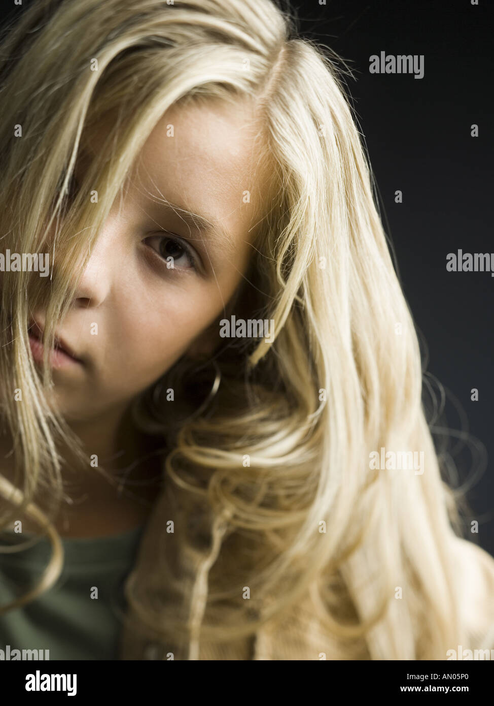 Portrait of a girl with her hair covering her face Stock Photo - Alamy