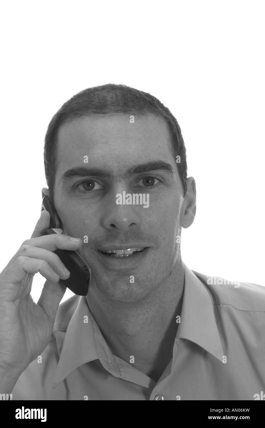 Young businessman using a flip style mobile phone Stock Photo - Alamy