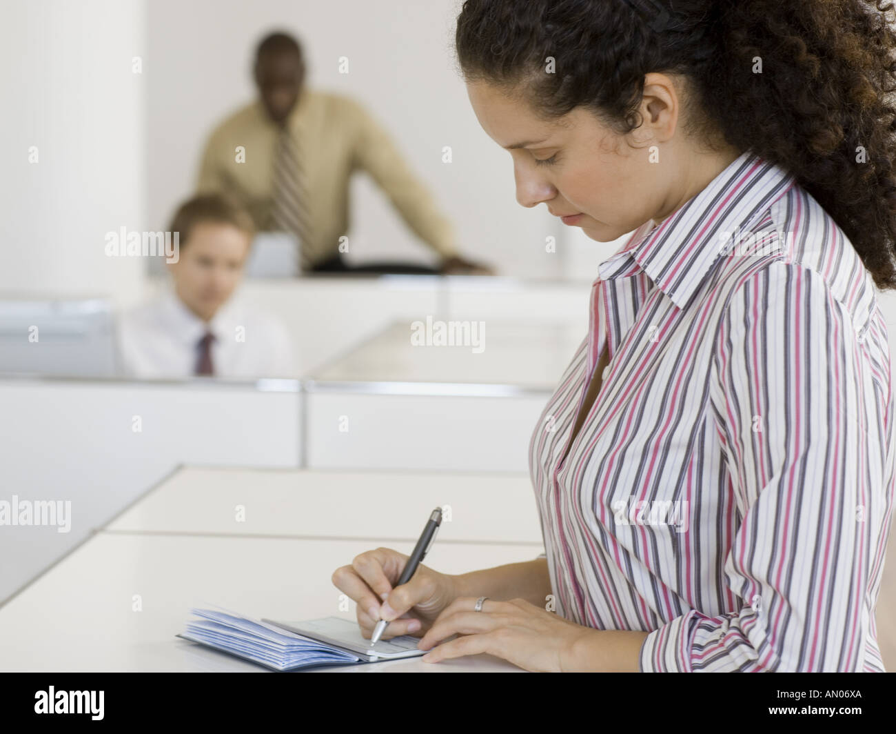 Woman check office brown hi-res stock photography and images - Alamy