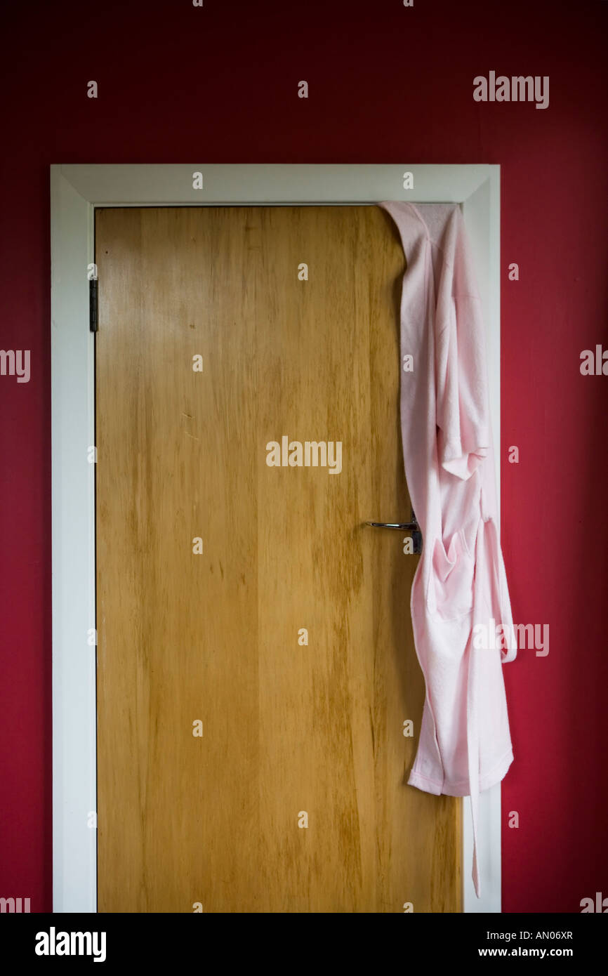 Woman door dressing gown hi-res stock photography and images - Alamy