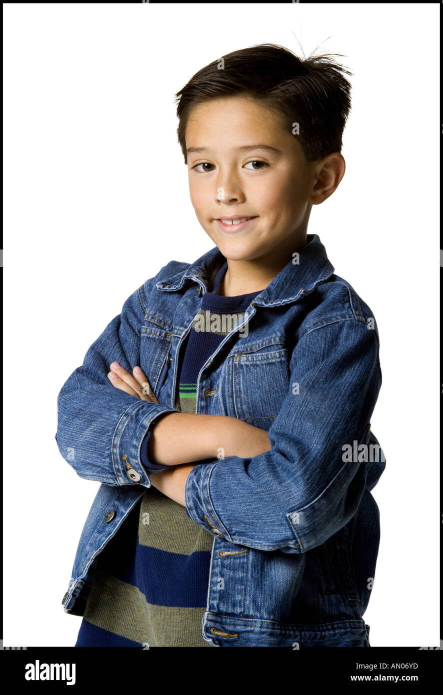Portrait of a boy smiling with his arms crossed Stock Photo - Alamy