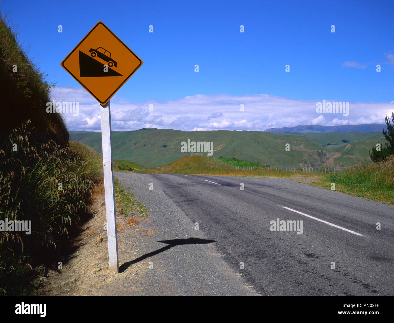 steep hill sign over the to of mountain range Stock Photo - Alamy
