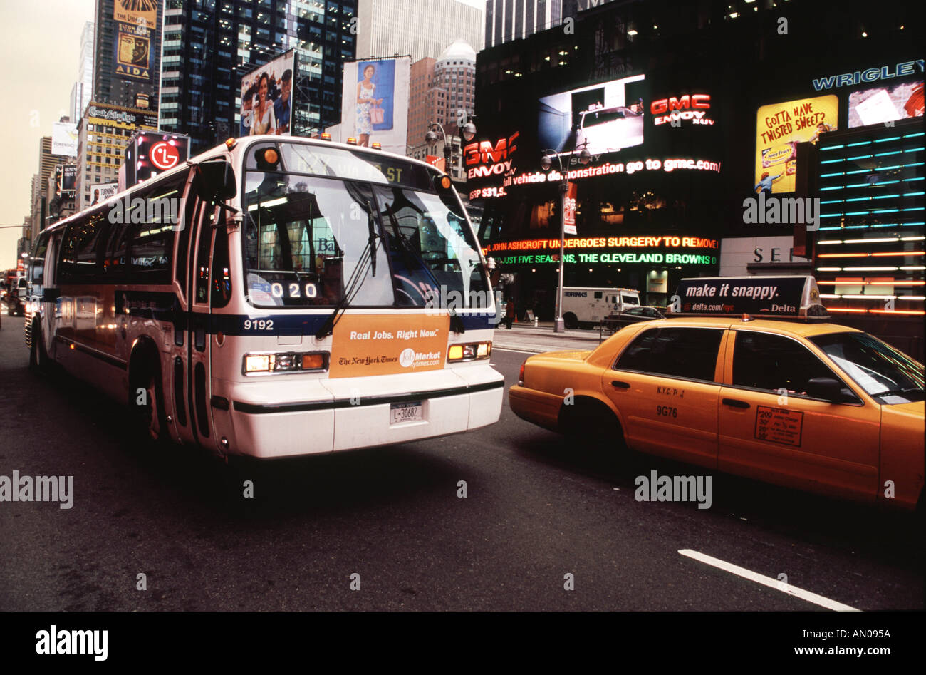 Yellow Cabs and bus at Times Square and Broadway in New York Stock ...