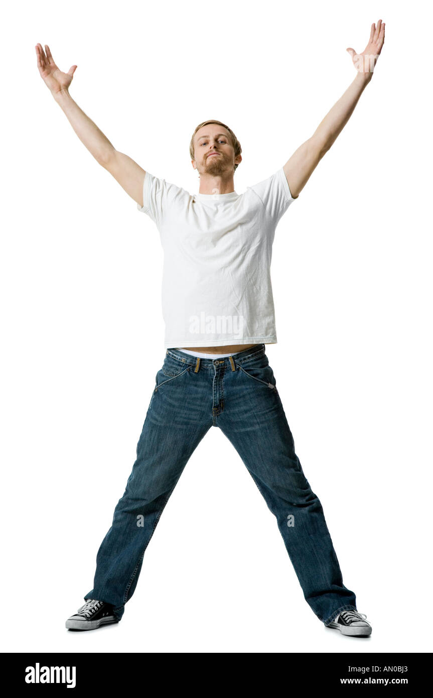 Portrait of a young man with his arms outstretched Stock Photo - Alamy