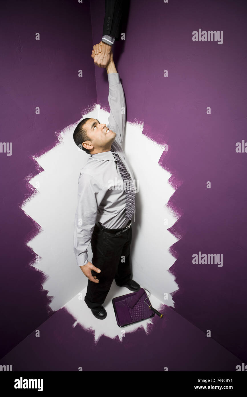 High angle view of a businessman reaching out for a man s hand Stock ...