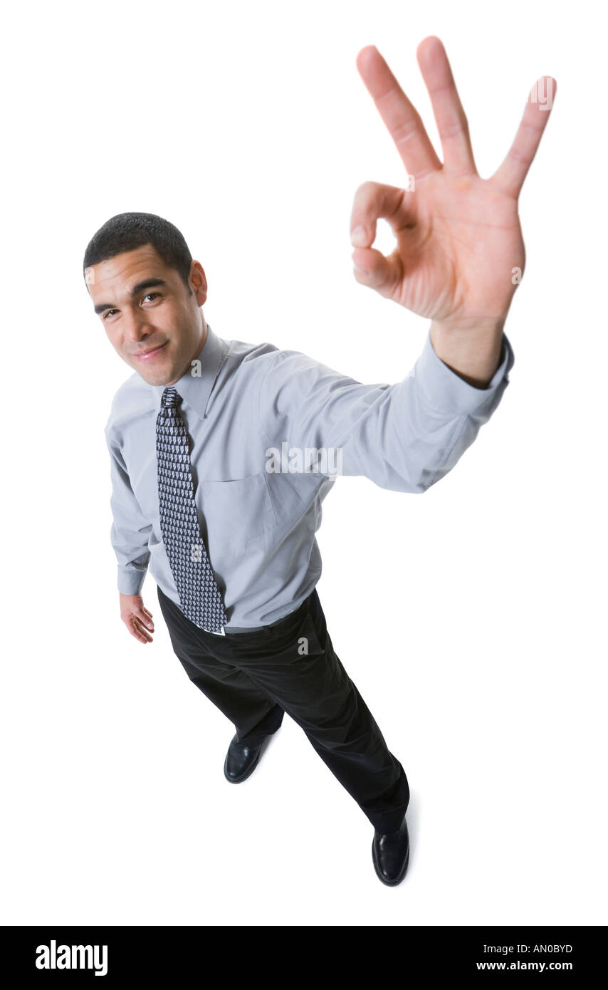 High angle view of a mid adult man making an ok sign Stock Photo - Alamy