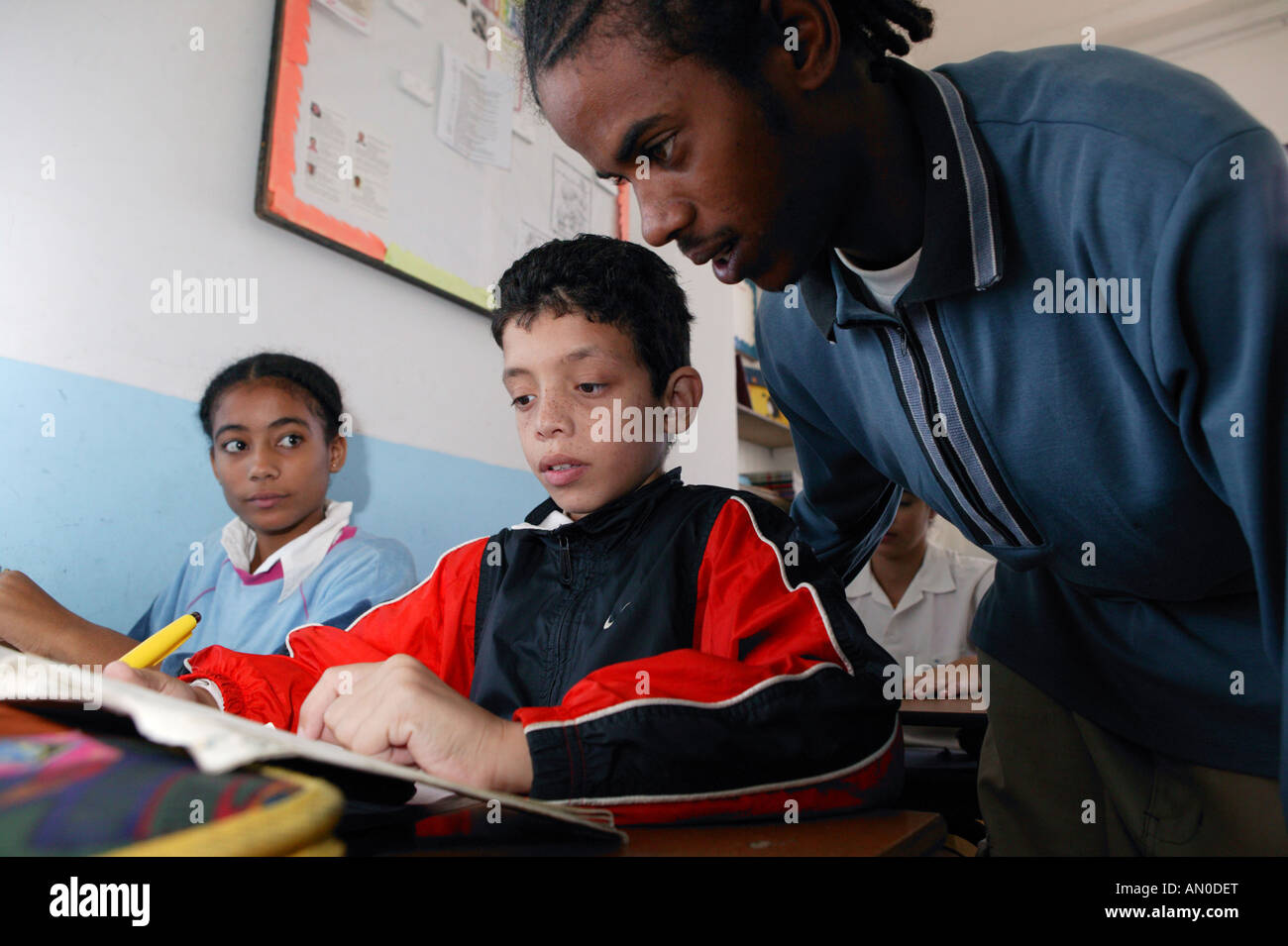 Black male teacher in classroom at Carlos J Finlay secondary school ...