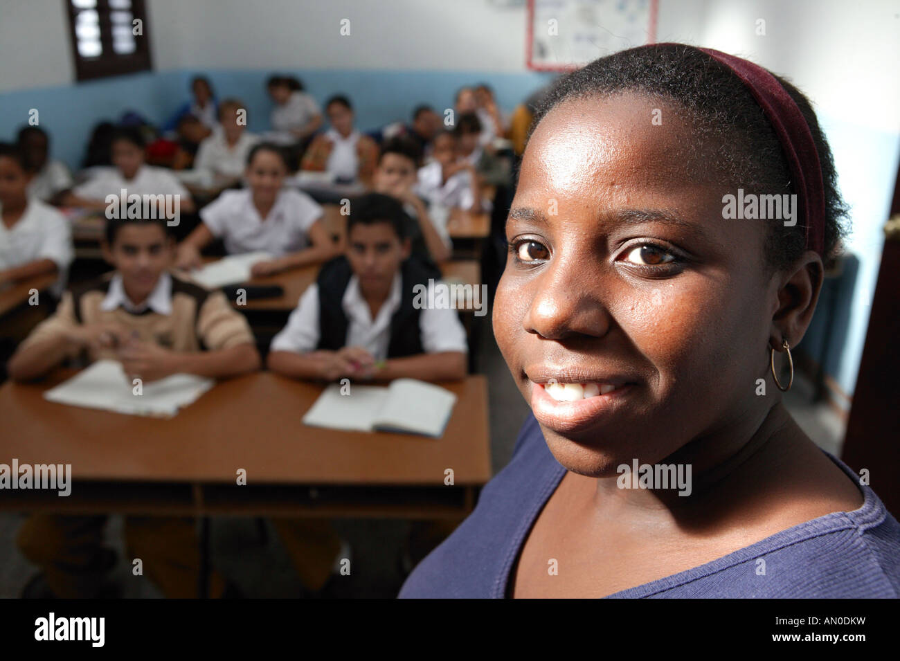 Black woman teacher in classroom at Carlos J Finlay secondary school ...