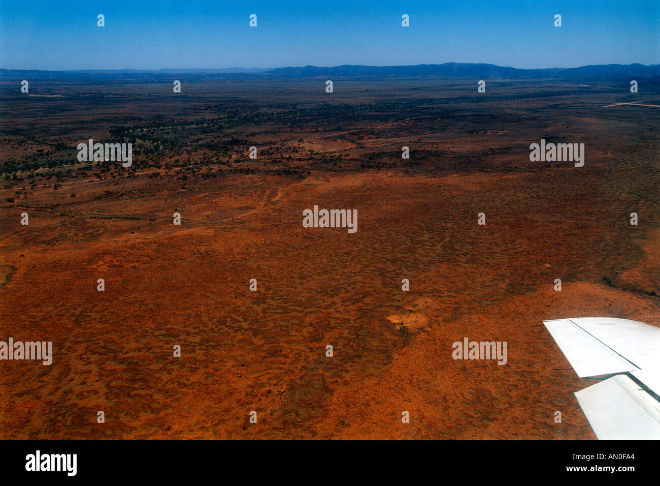 Plane flying over mountain ranges hi-res stock photography and images ...