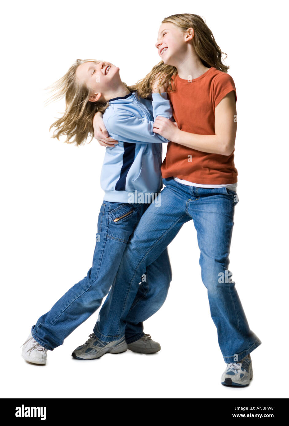 Two sisters playing with each other Stock Photo - Alamy