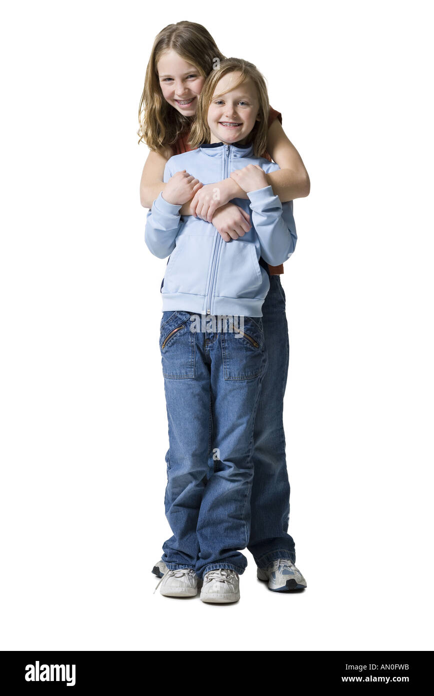 Portrait of two sisters smiling Stock Photo - Alamy