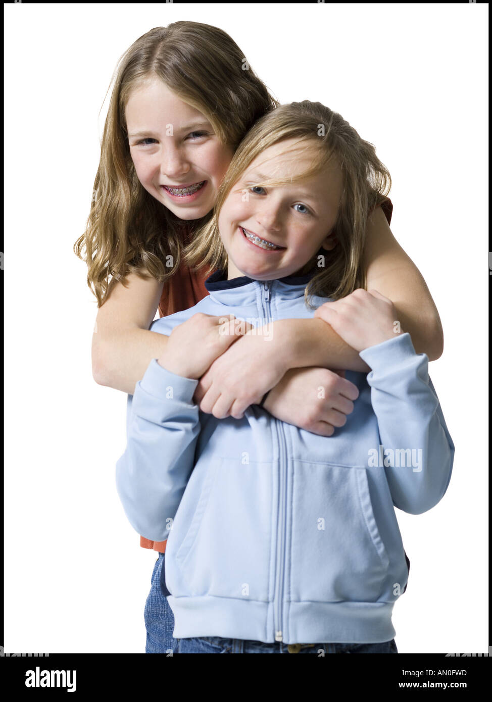 Portrait of two sisters smiling Stock Photo - Alamy