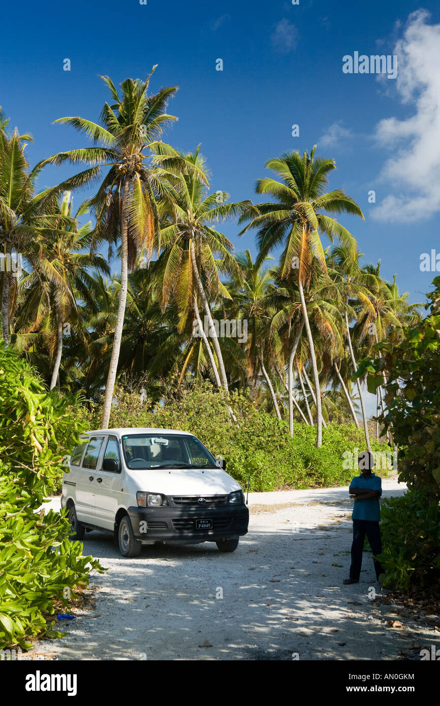 Maldives Addu Atoll Hitaddu Mulekede tourist vehicle on rural road ...