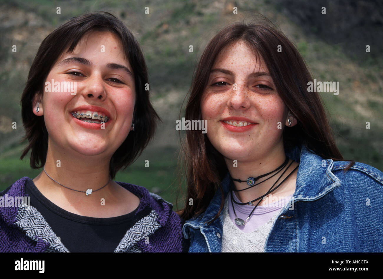 Two teenage girls smiling. Spain Stock Photo - Alamy