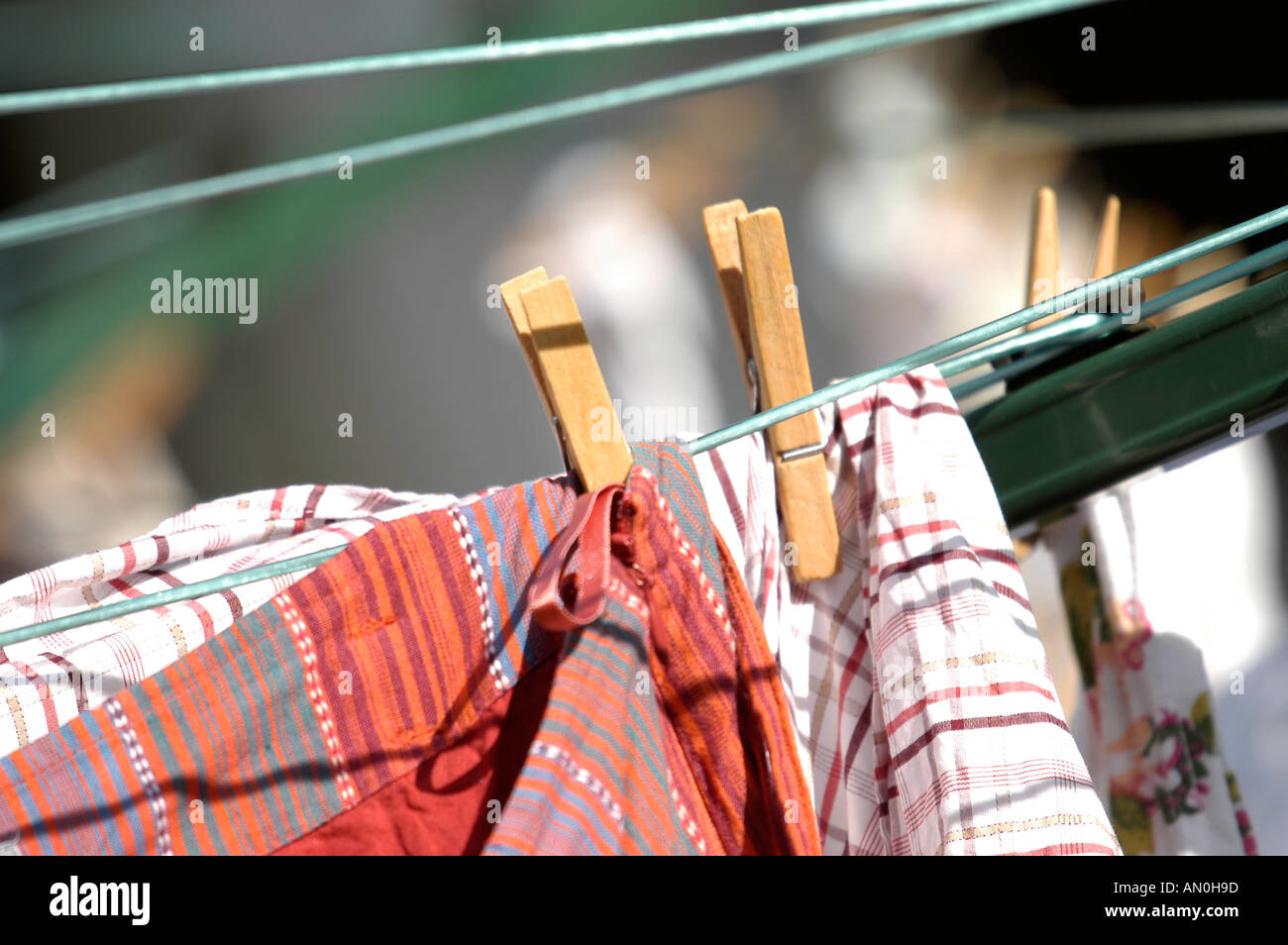 Pegs and clothes on a washing line Stock Photo - Alamy