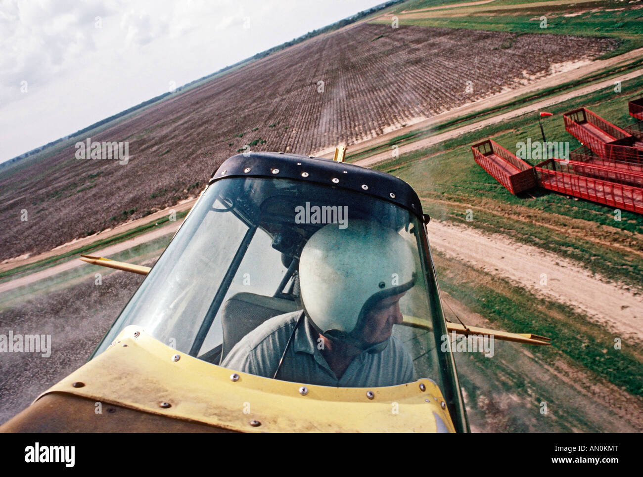 Crop duster spraying cotton crop in rural Arkansas USA Stock Photo - Alamy