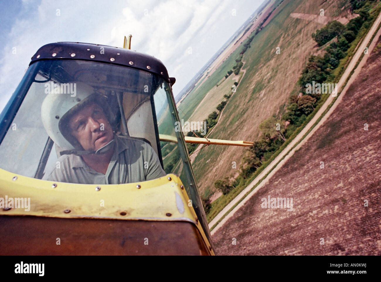 Crop duster spraying cotton crop in rural Arkansas USA Stock Photo - Alamy