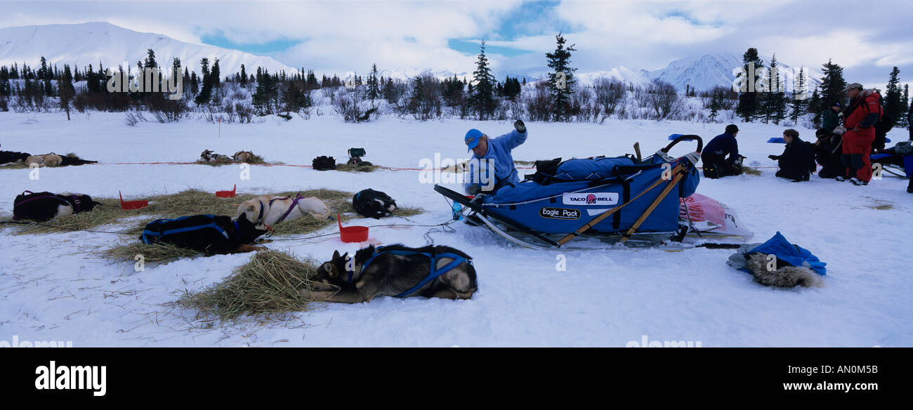 USA Alaska Musher Dee Dee Jonrowe works on her damaged sled at Rainy ...