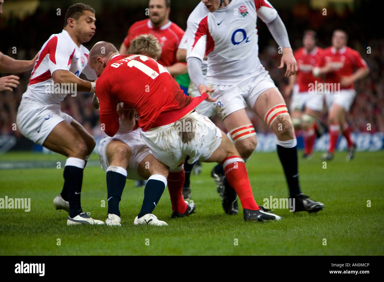 Gareth Thomas tackling an English player during the Wales England match ...